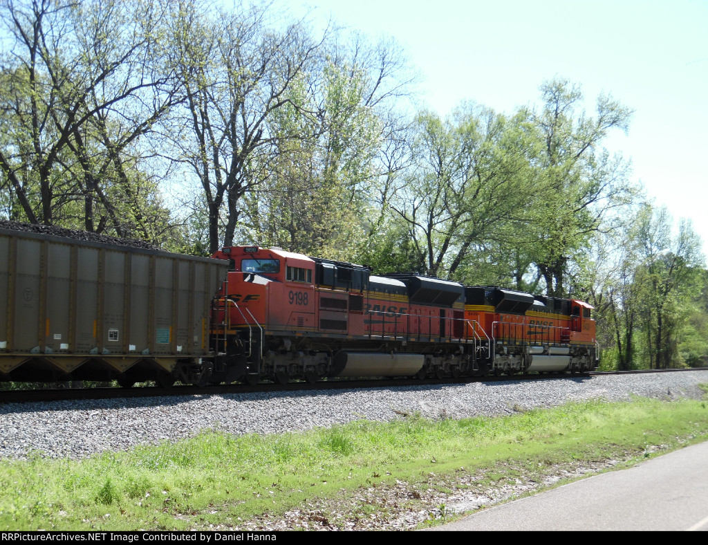 BNSF SD70ACe's lead a loaded coal train